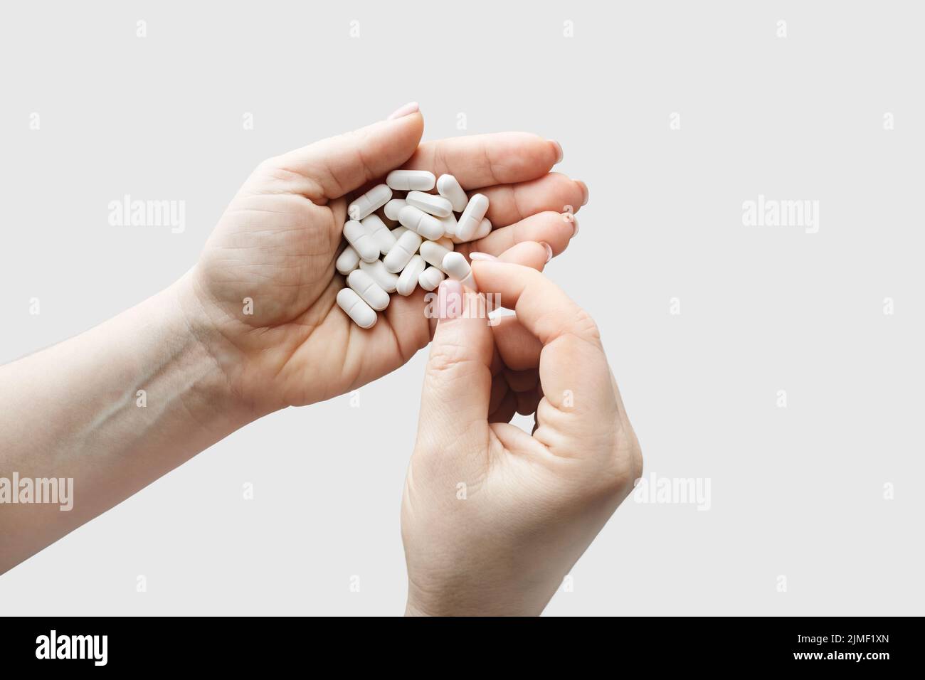 Female taking pill doctor prescription hi-res stock photography and ...