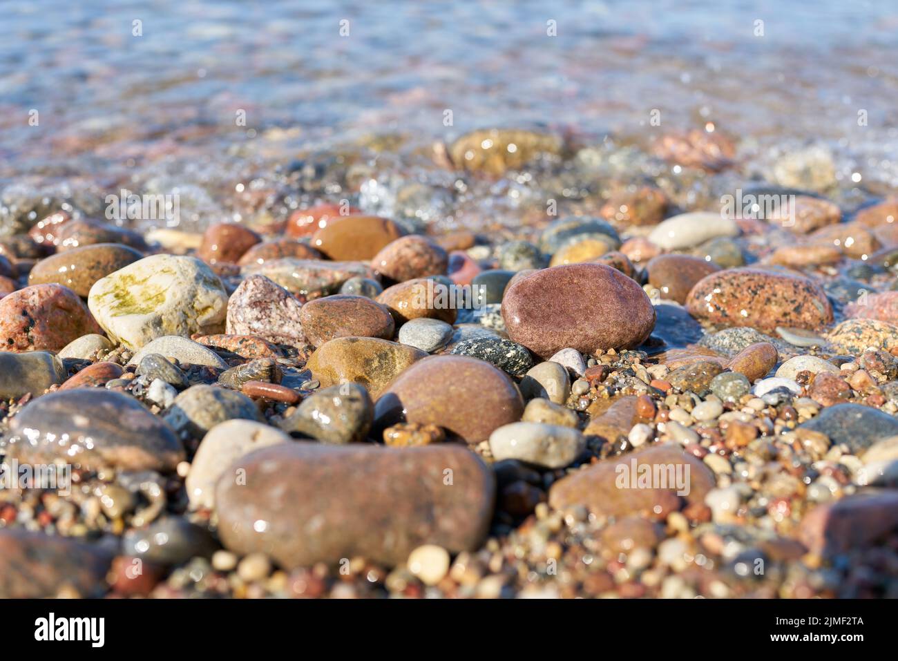Gravel on the beach of the Baltic Sea near Kolobrzeg in Poland in ...