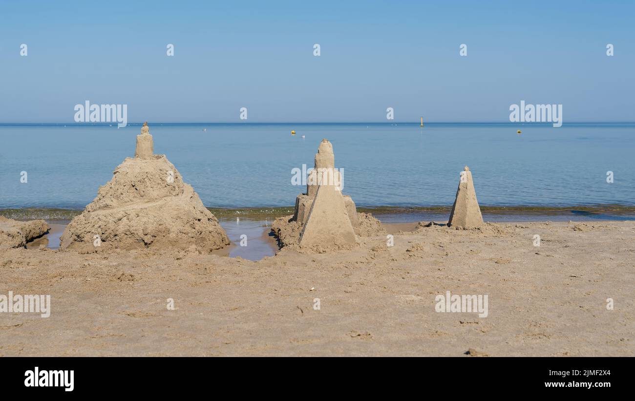 Sandcastles on the beach of Kolobrzeg on the Polish Baltic coast in ...