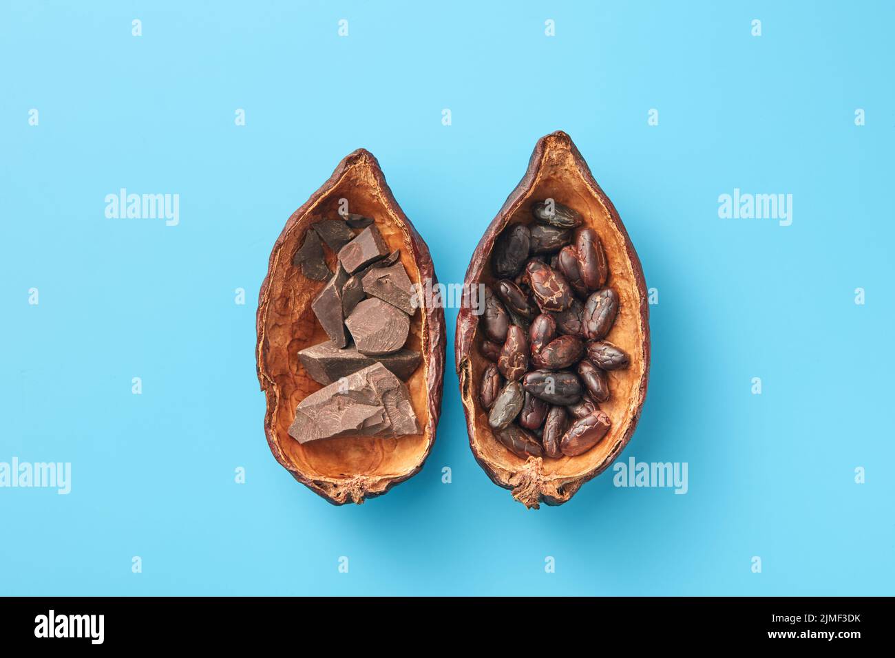 Halved pod with chocolate and beans Stock Photo - Alamy