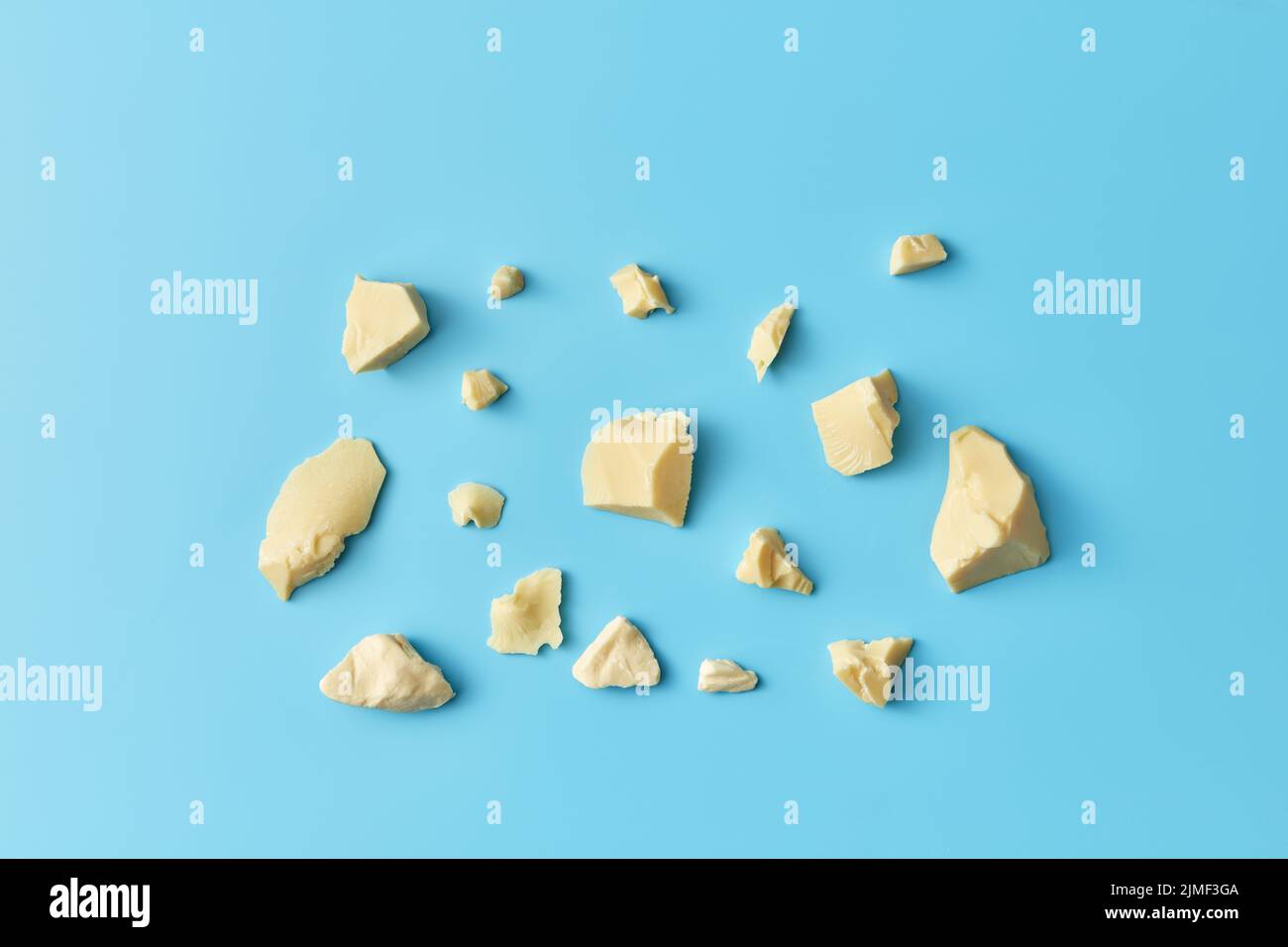 Pile of raw cocoa butter chunks Stock Photo - Alamy