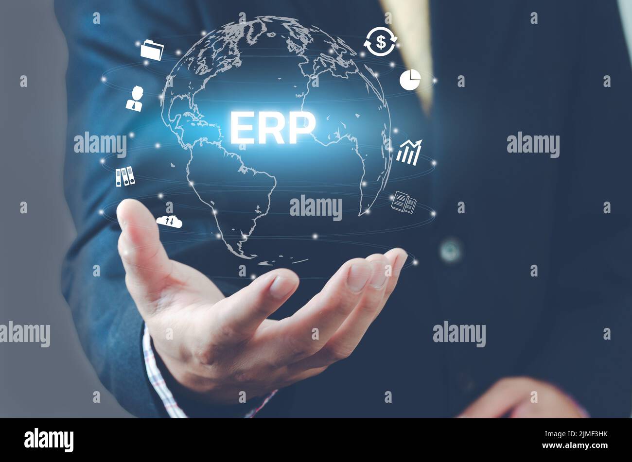 Businessman hand world virtual screen ERP enterprise resource planning ...