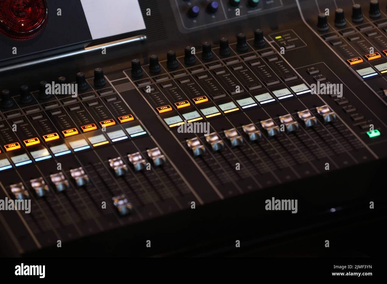 Professional sound and audio mixer control panel with buttons and ...