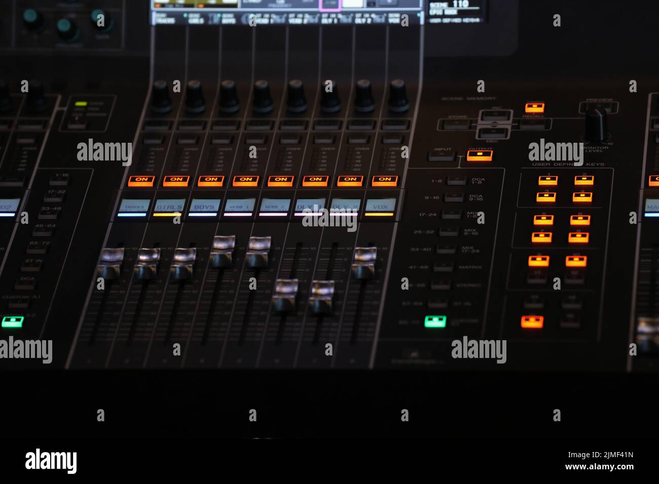 Professional sound and audio mixer control panel with buttons and ...
