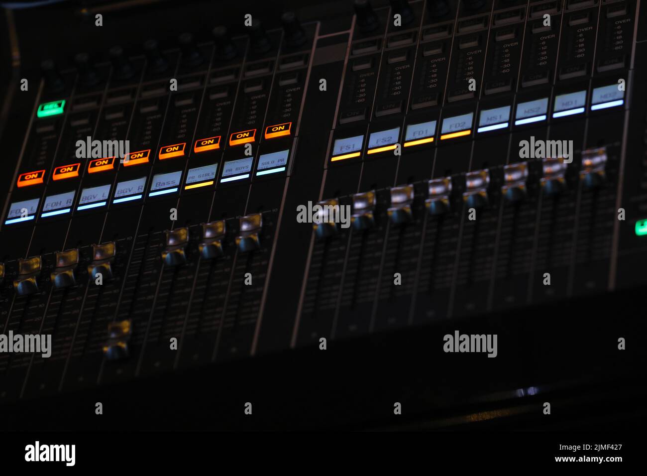 Professional sound and audio mixer control panel with buttons and ...