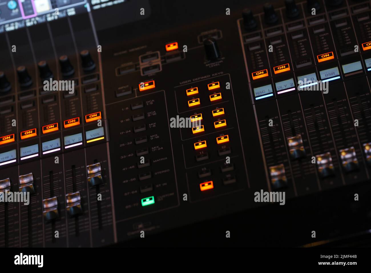 Professional sound and audio mixer control panel with buttons and ...