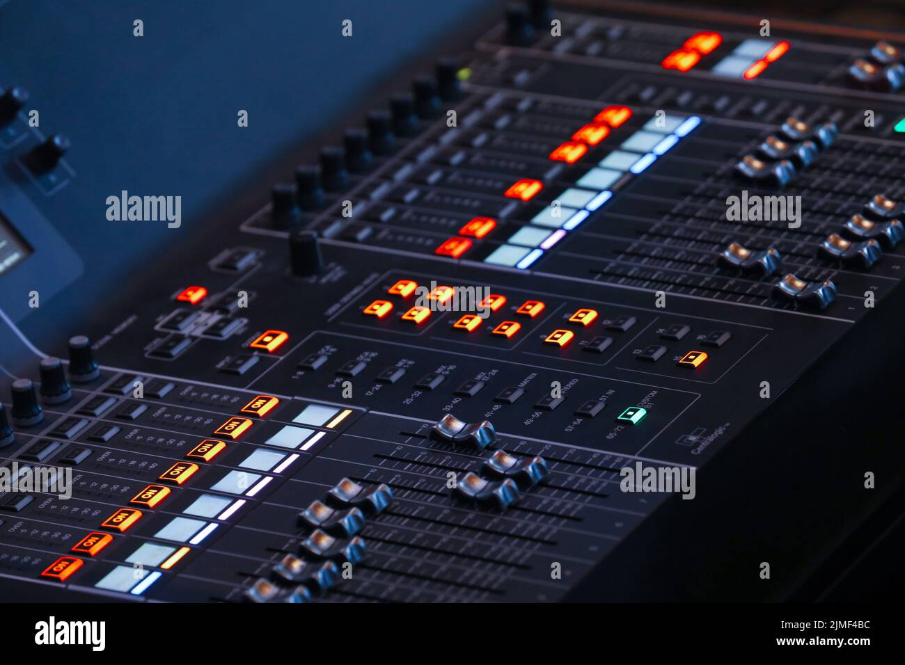 Professional sound and audio mixer control panel with buttons and ...