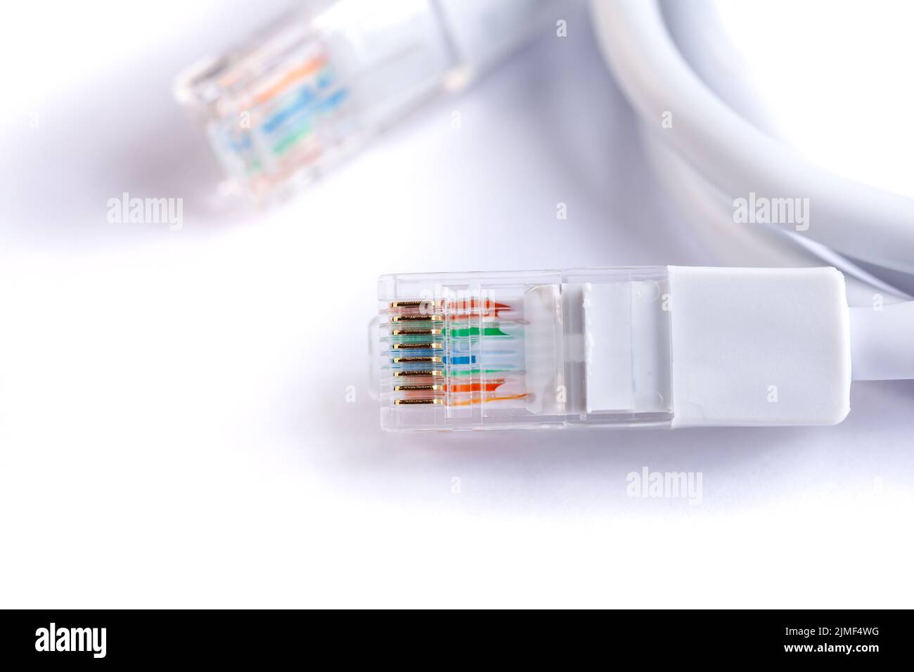 An image of computer network cable on white background. Technology ...
