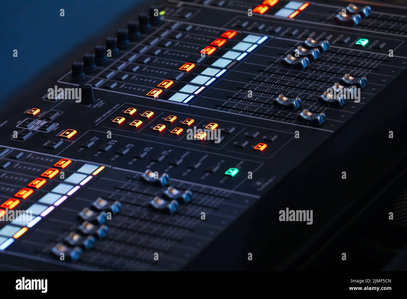 Professional sound and audio mixer control panel with buttons and ...