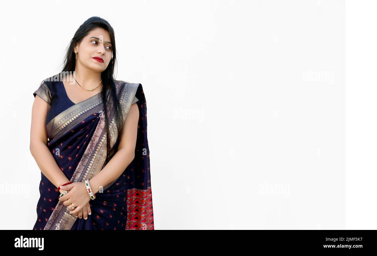 A Portrait of a happy woman of Indian origin wearing traditional dress ...