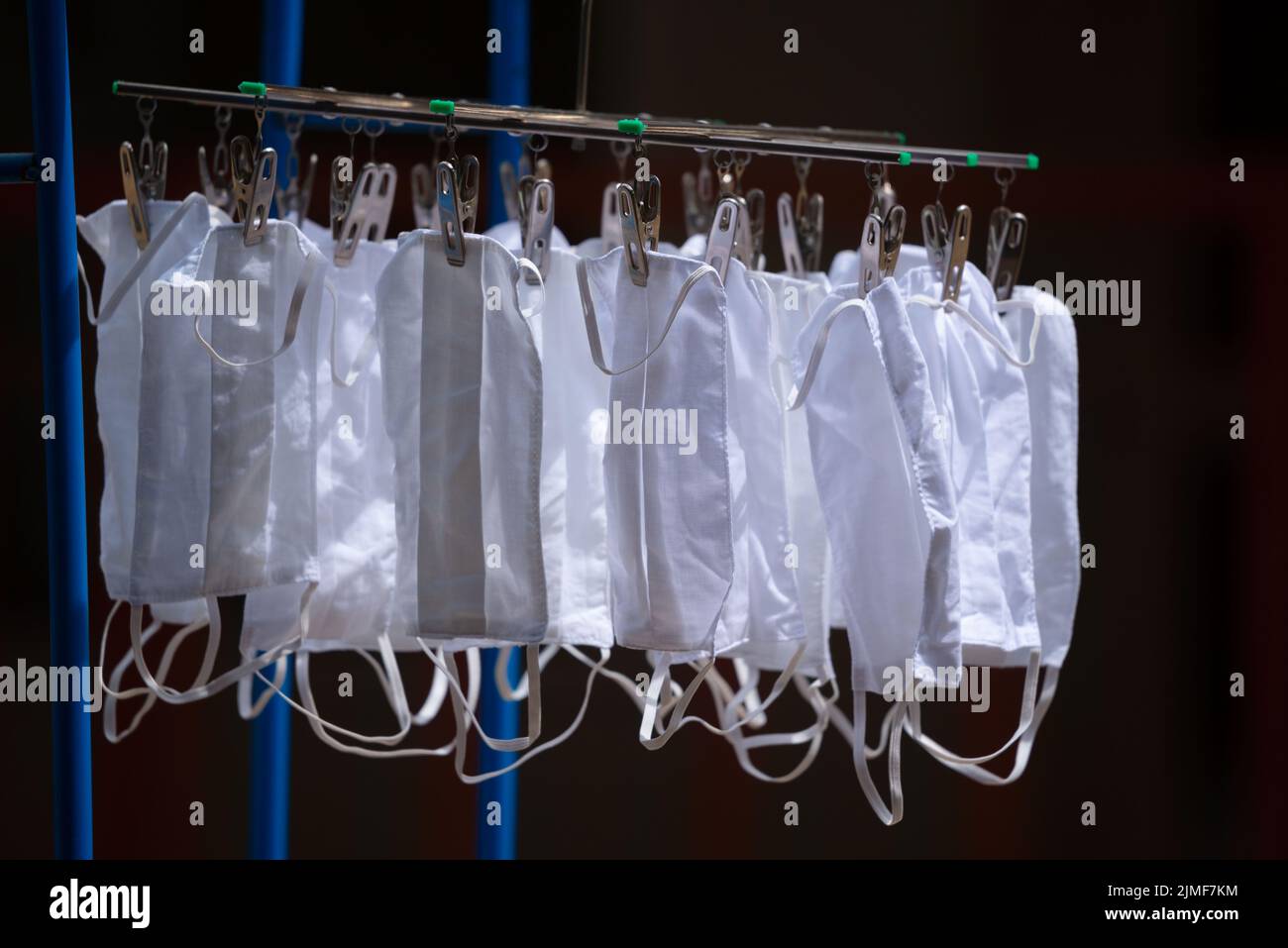 Face masks hanging hi-res stock photography and images - Alamy