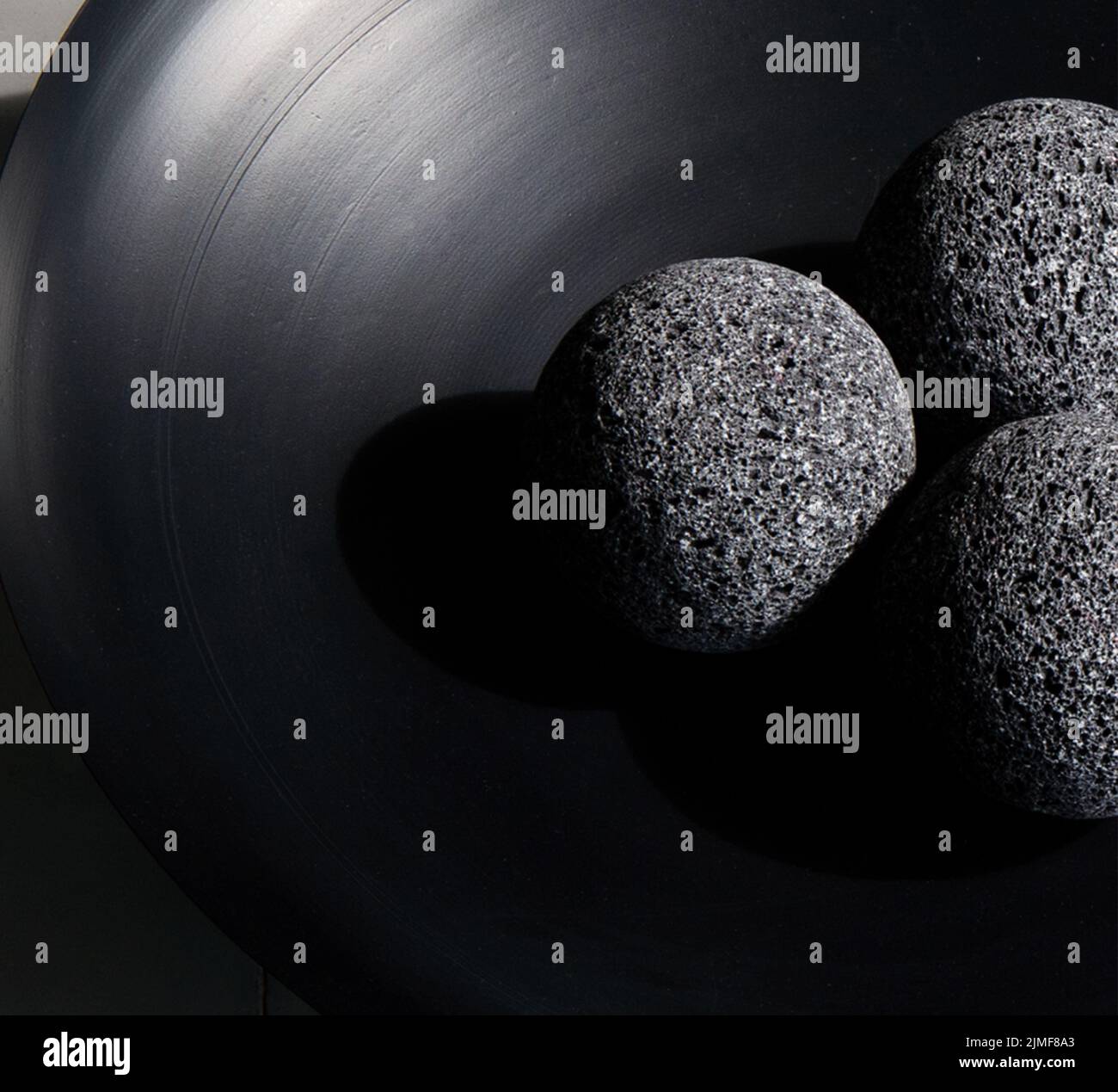 A closeup of granite balls or stone spheres perfect for your exterior ...