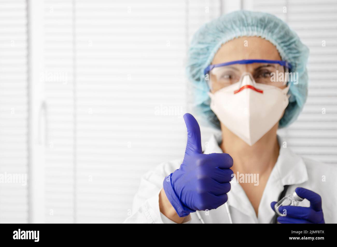 Portrait of happy smiling caucasian female doctor in mask glasses ...