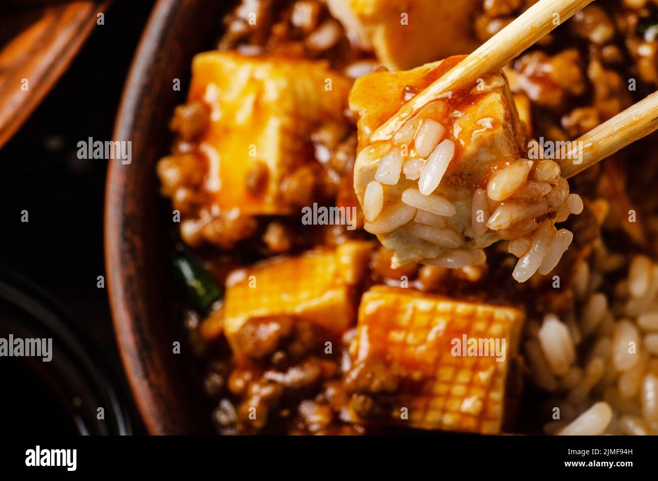 Traditional Chinese food mapo tofu dish with pork and steamed rice ...