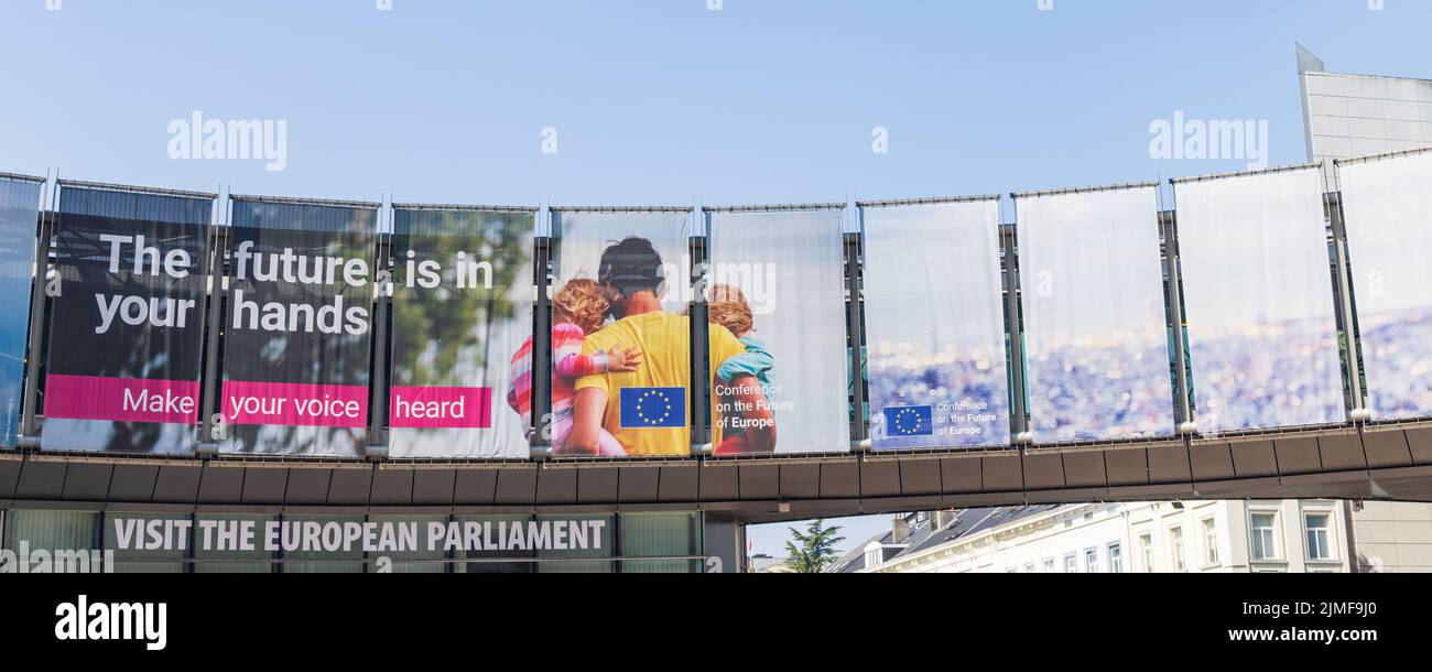 Brussels , Belgium - March 24, 2022: Digital photo banner at square in ...