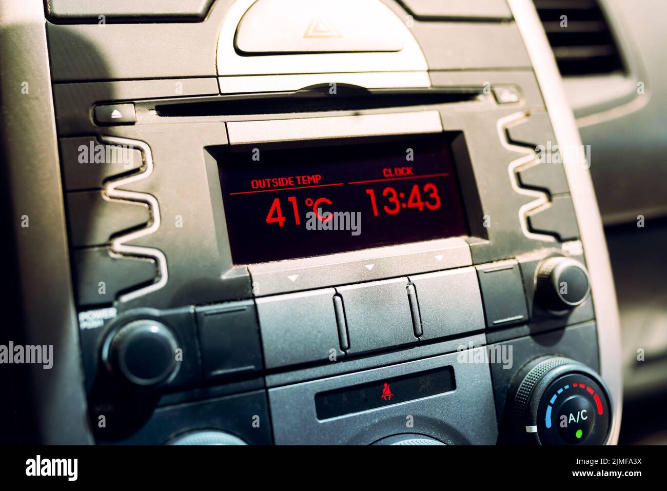 Heat waves in summer. High temperature on car dashboard display. Hot ...