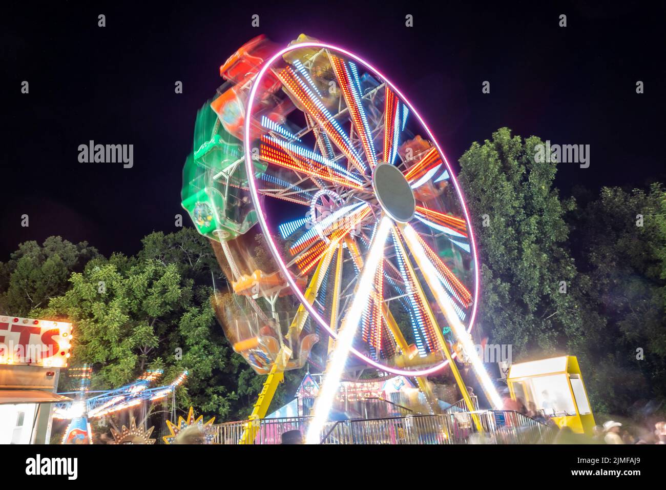 Ferris wheel lights at state fair at night Stock Photo - Alamy
