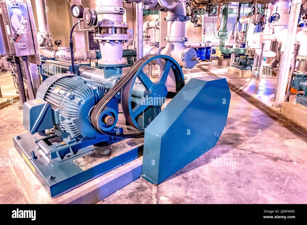 Equipment, cables and piping as found inside of industrial power plant ...