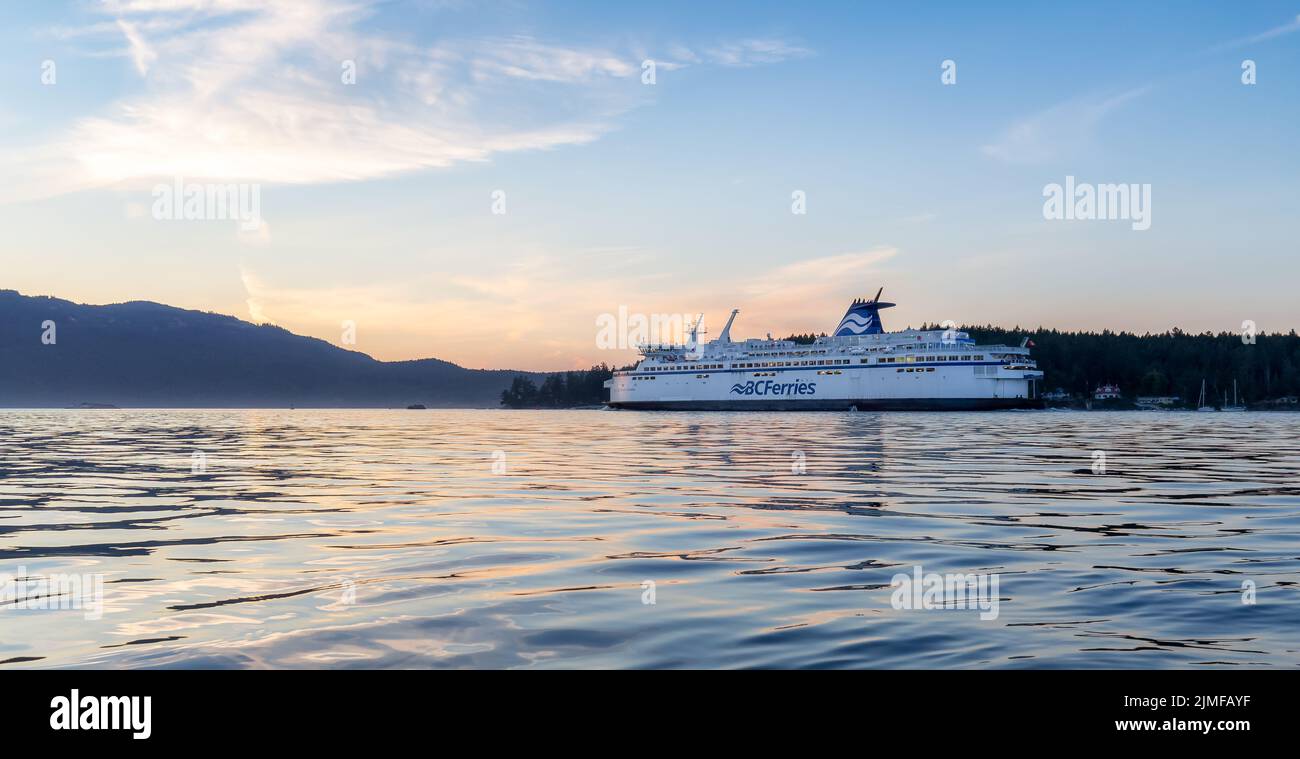 BC Ferries Boat leaving the Terminal in Swartz Bay during colorful ...