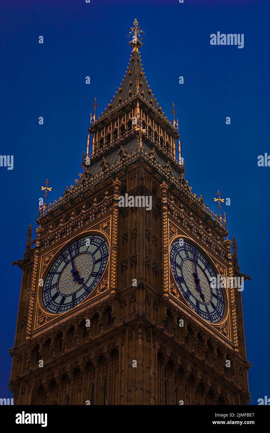 A low angle shot of Big Ben with beautiful architectural details and ...