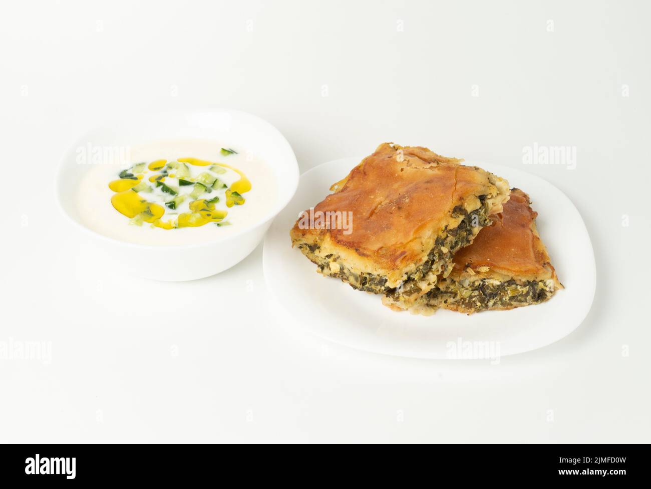 The most traditional Albanian, Balkans food. Spinach pie and yogurt ...