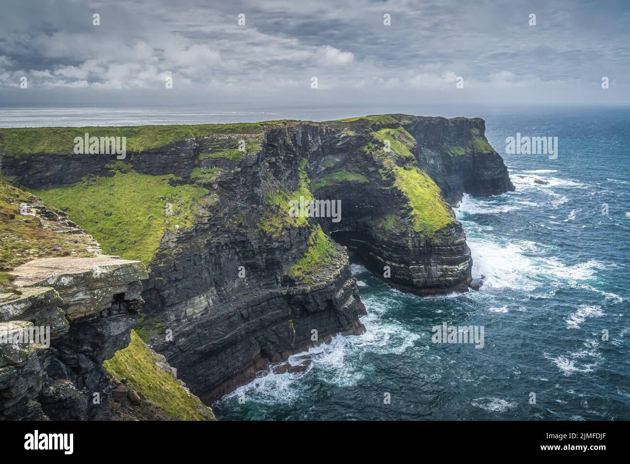 Waves of Atlantic Ocean crashing on iconic Cliffs of Moher, popular ...