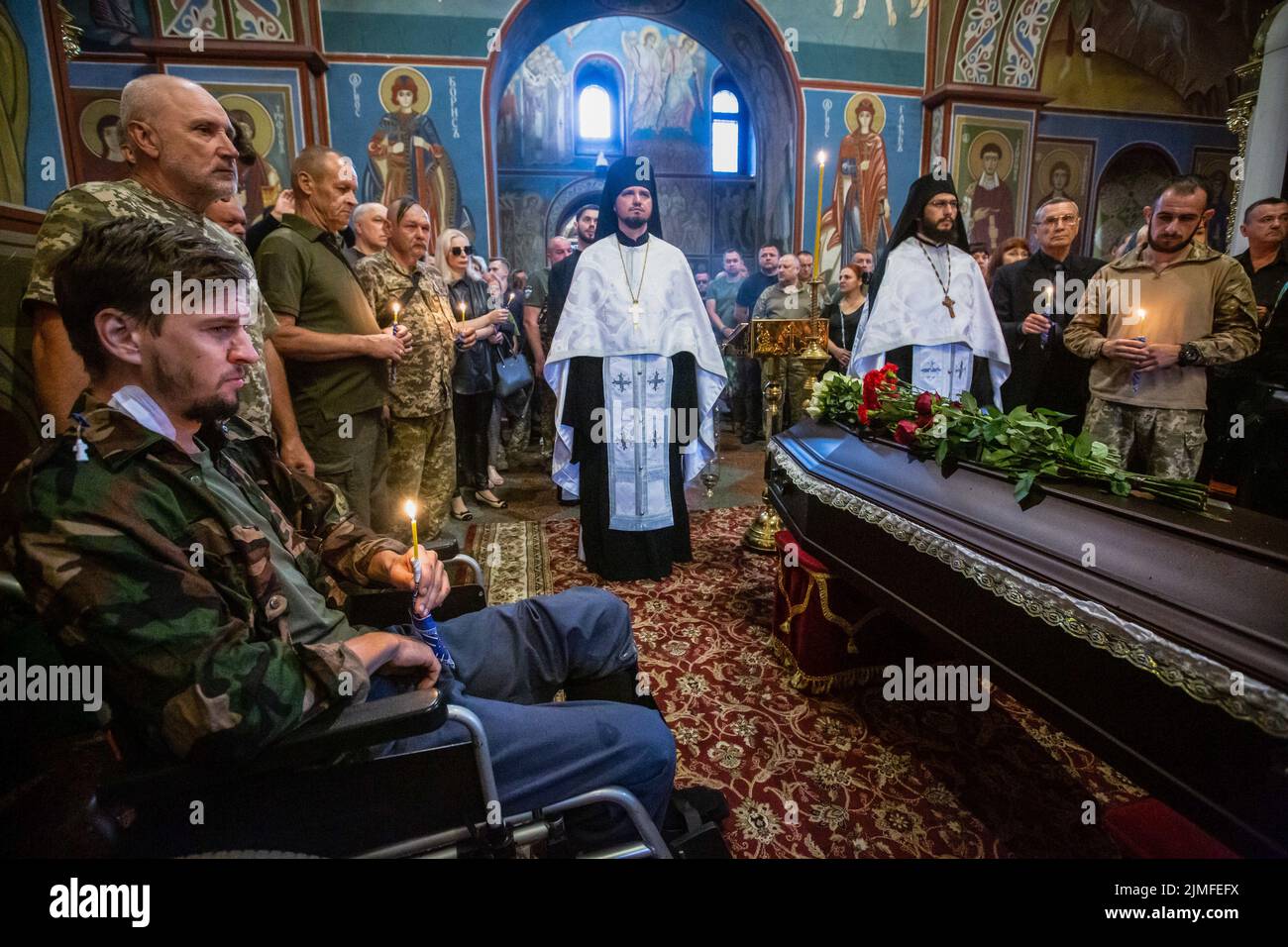 Kyiv, Ukraine. 05th Aug, 2022. Relatives and friends attend a memorial ...