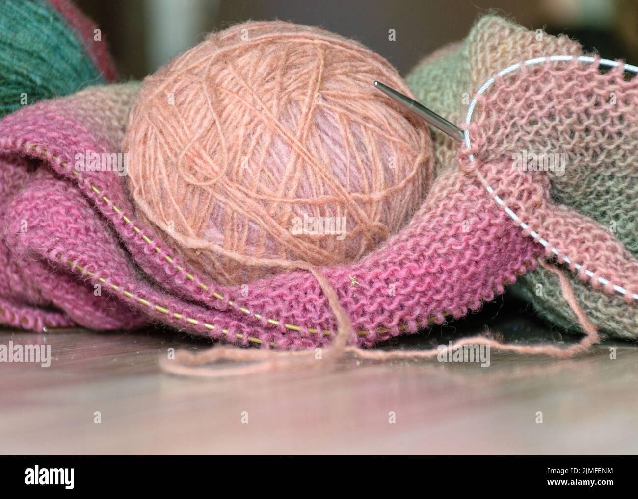 Knitted clothing, accessory in the process of creation. Knitting ...