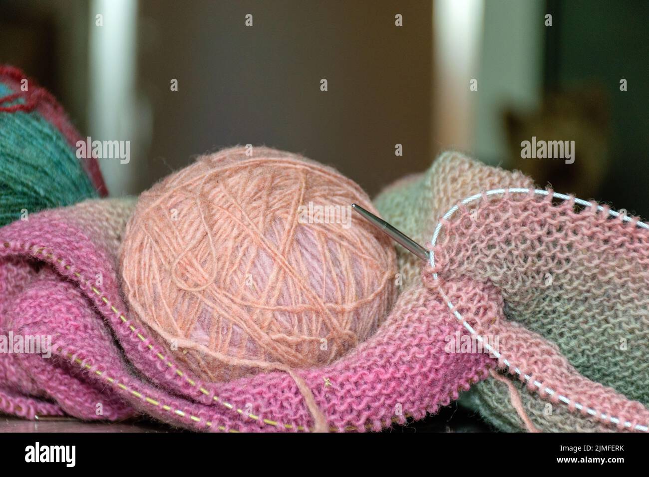 Knitted clothing, accessory in the process of creation. Knitting ...