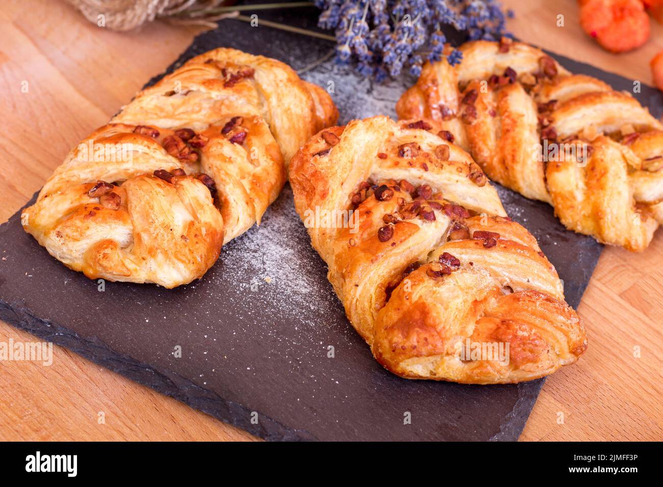 Maple and pecan plait Danish pastry Stock Photo - Alamy