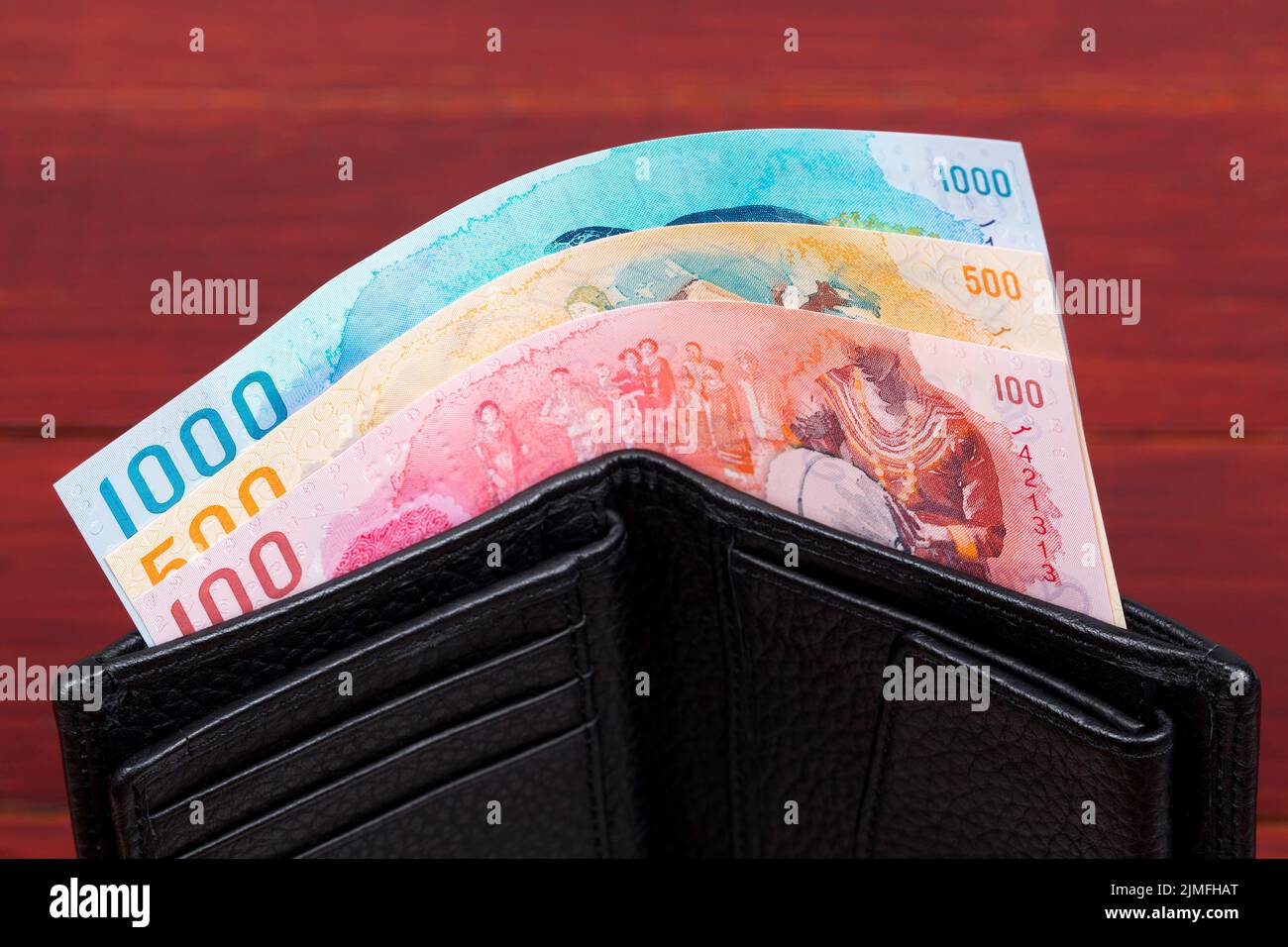 Maldivian money in the black wallet Stock Photo - Alamy