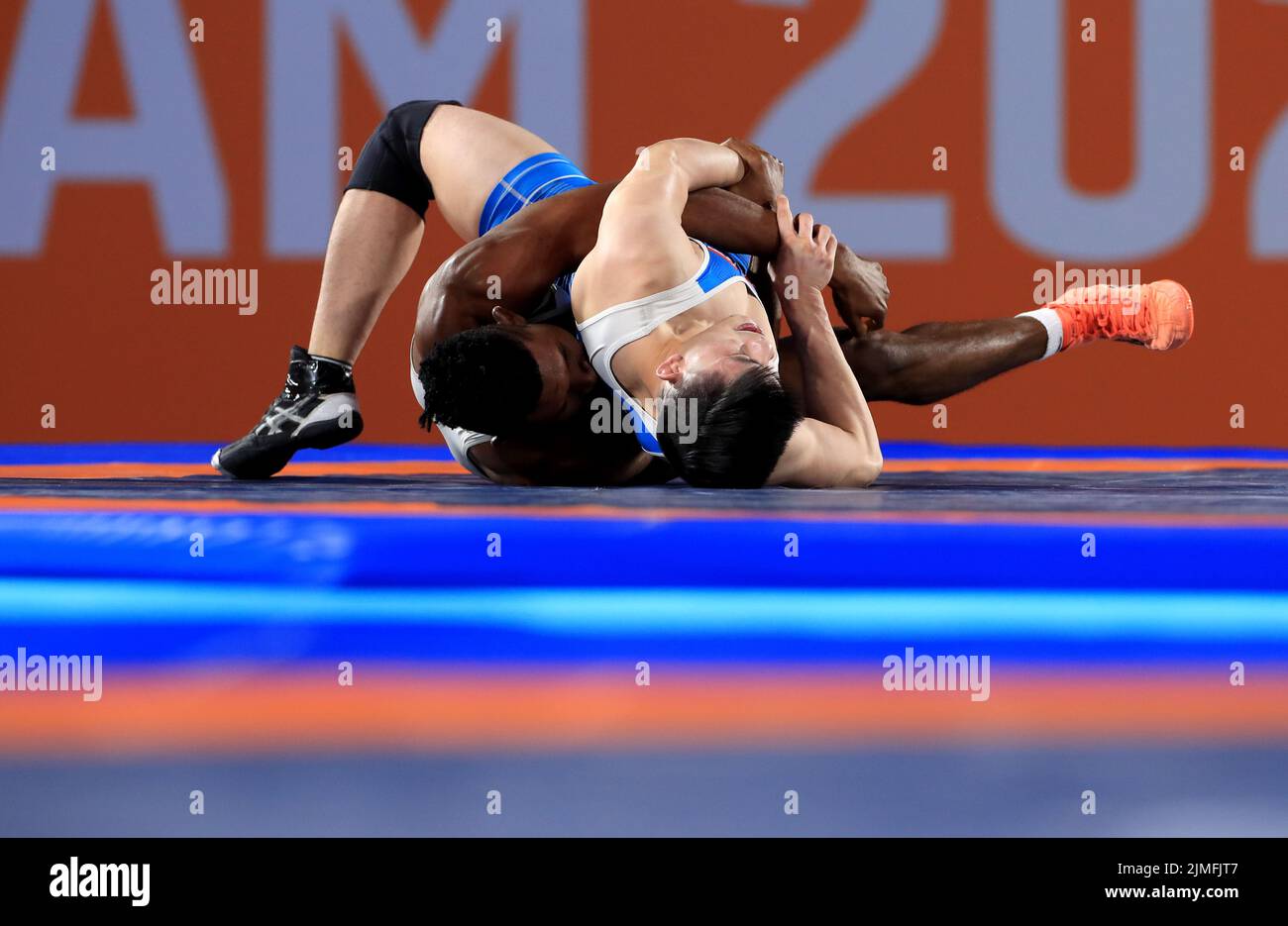 Nigeria’s Ogbonna Emmanuel John competes against Singapore’s Hong Yeow ...