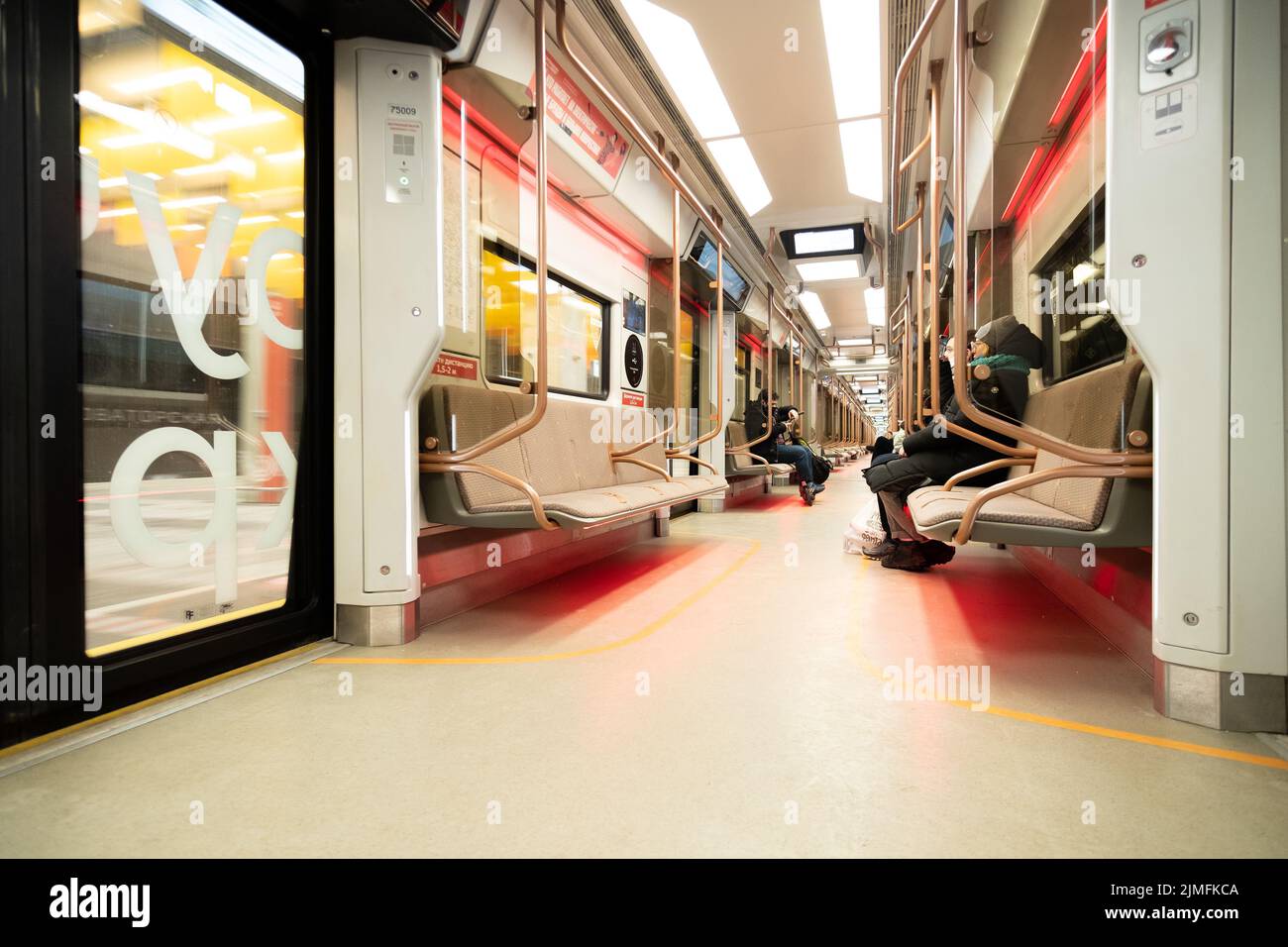 Passengers in the interior of a Moscow metro carriage Stock Photo - Alamy