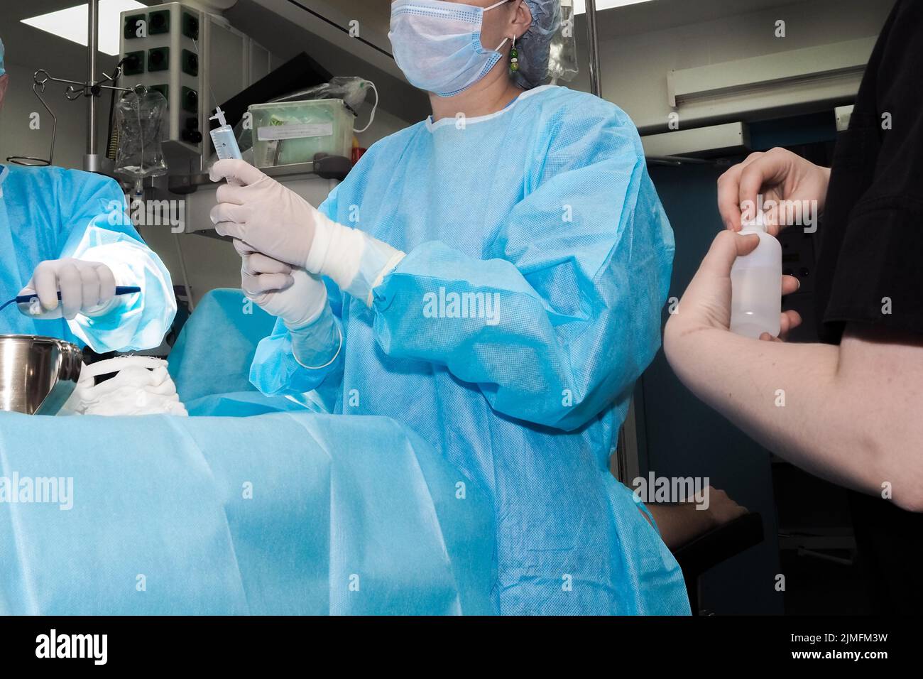 Doctor with big injection hi-res stock photography and images - Alamy