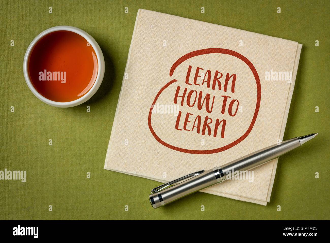 learn how to learn inspirational note note on a napkin with a cup of ...