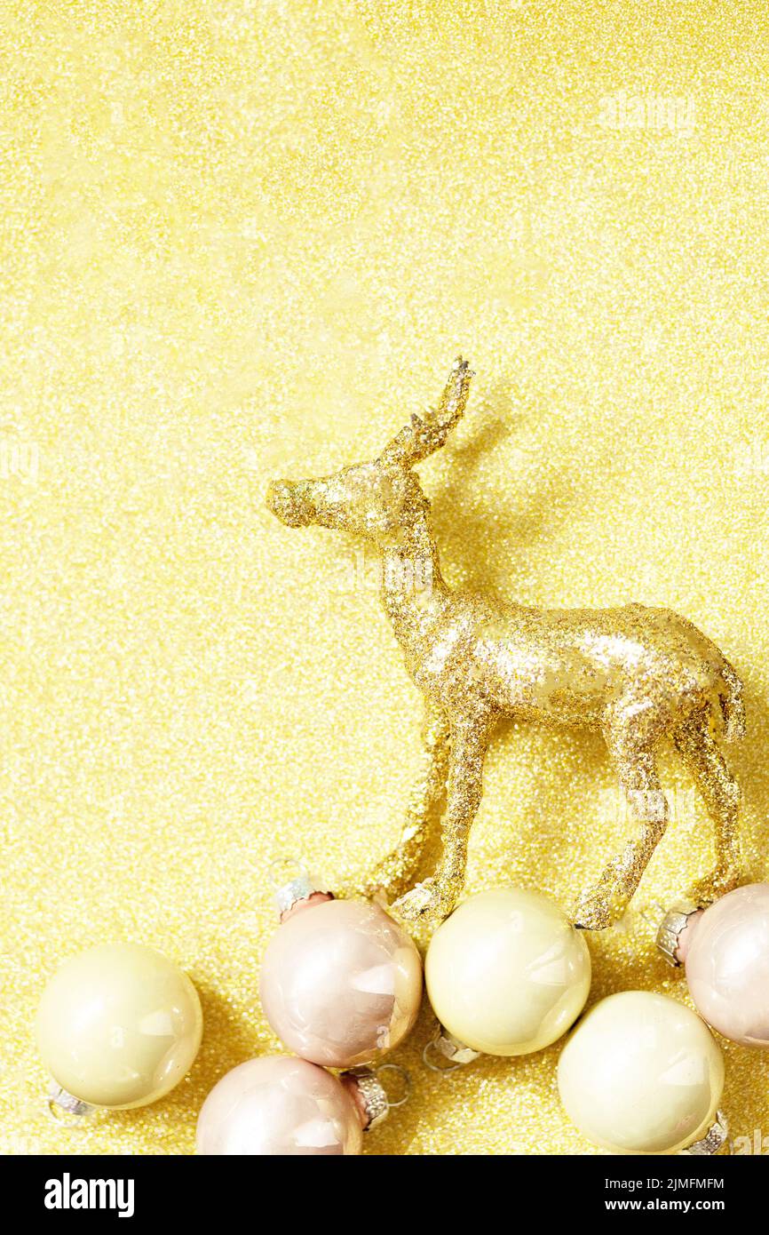 Magic of christmas. Christmas deer gold color palette with decor on a ...
