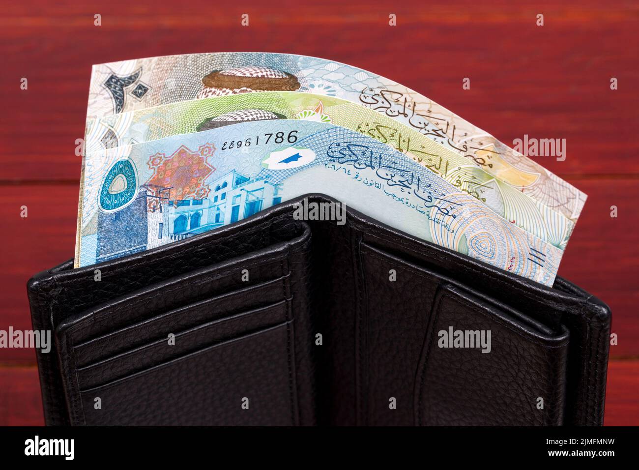 Bahraini money in the black wallet Stock Photo - Alamy
