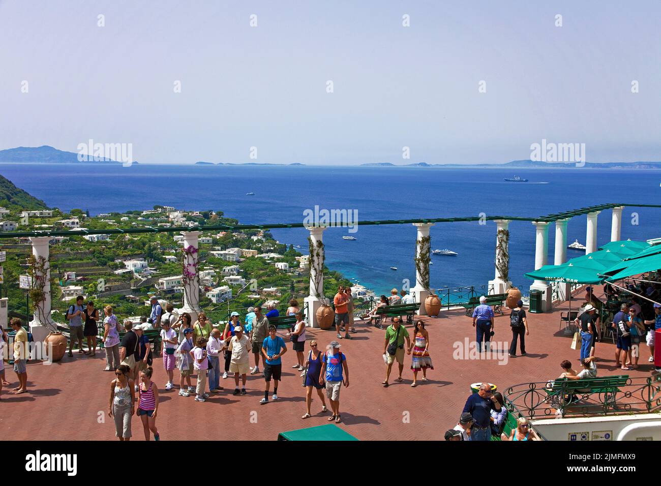 Tourists on the viewing terrace close Piazza Umberto I, Capri town ...