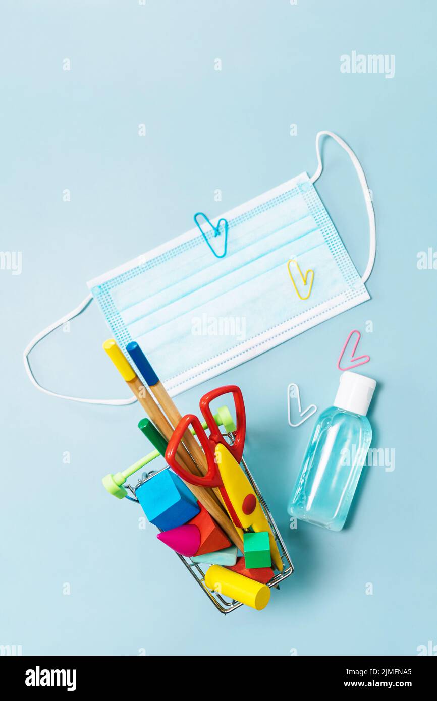 School supplies, poppit anti-stress, face mask, bottle of sanitizer ...