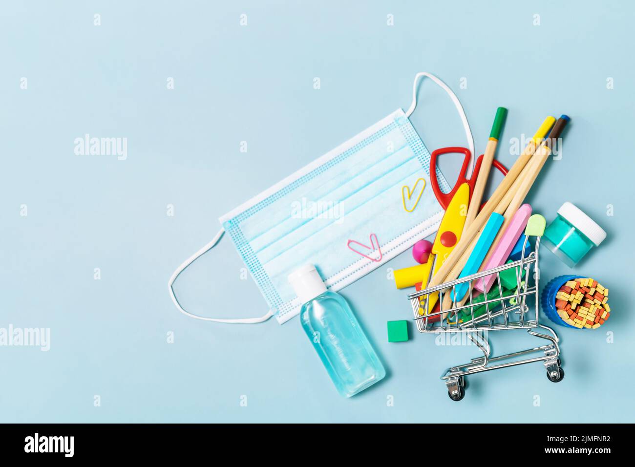 School supplies, poppit anti-stress, face mask, bottle of sanitizer ...