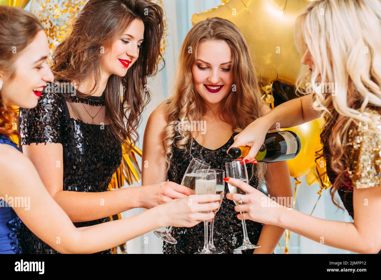 fancy party festive attire birthday champagne Stock Photo - Alamy