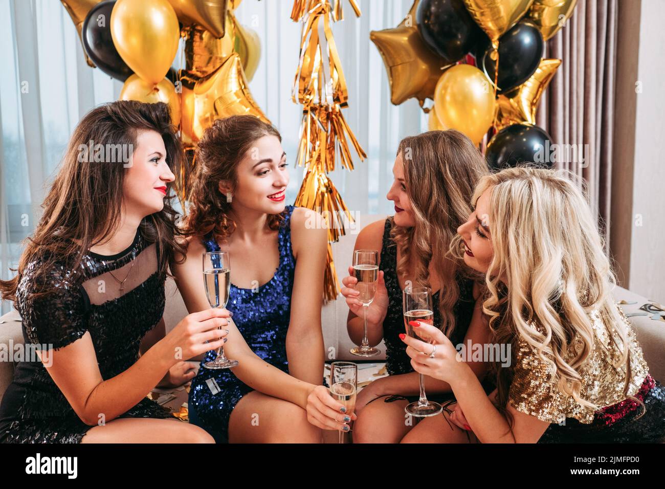 girls party decorated room sharing moments Stock Photo - Alamy