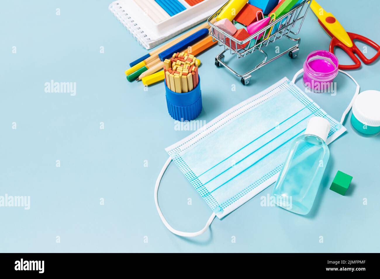 School supplies, poppit anti-stress, face mask, bottle of sanitizer ...