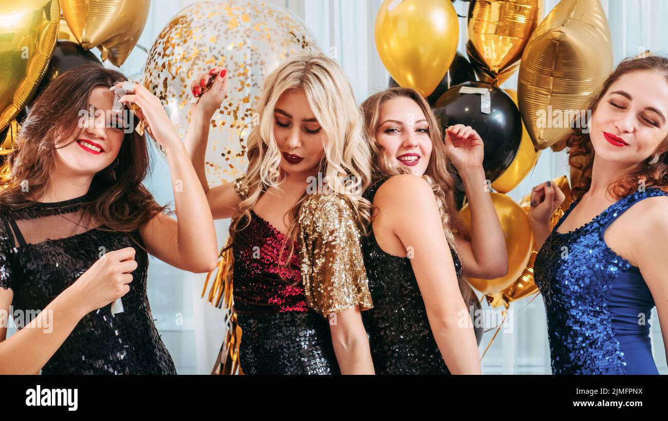 festive party amused dancing girls balloons Stock Photo - Alamy