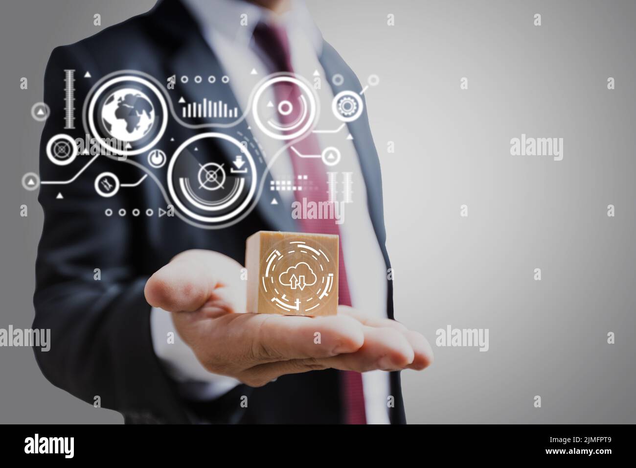Businessman holding cloud computing diagram show on wood block hand ...