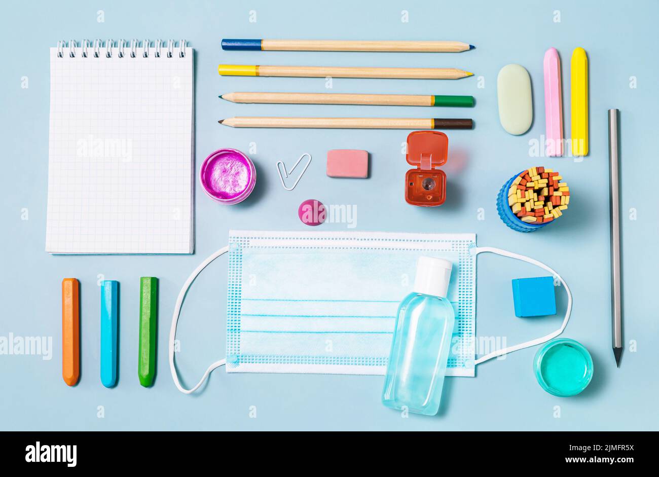 School supplies, poppit anti-stress, face mask, bottle of sanitizer ...