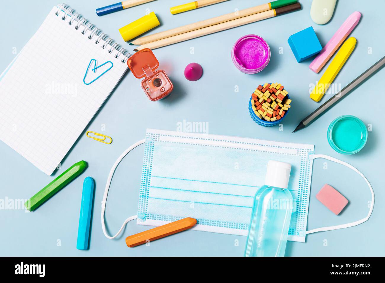 School supplies, poppit anti-stress, face mask, bottle of sanitizer ...