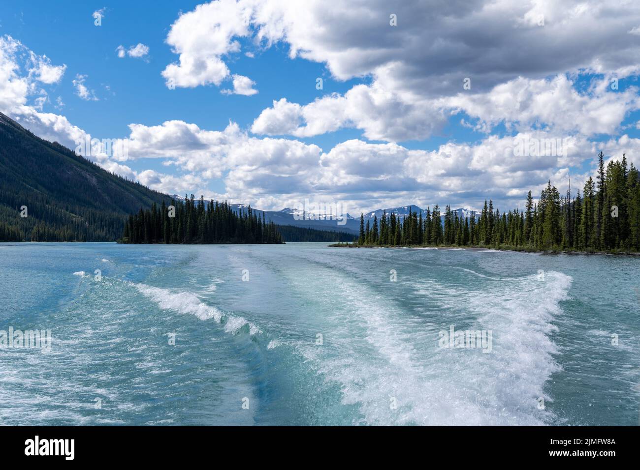Wake of a boat leaving Spirit Island on Maligne Lake in Jasper National ...