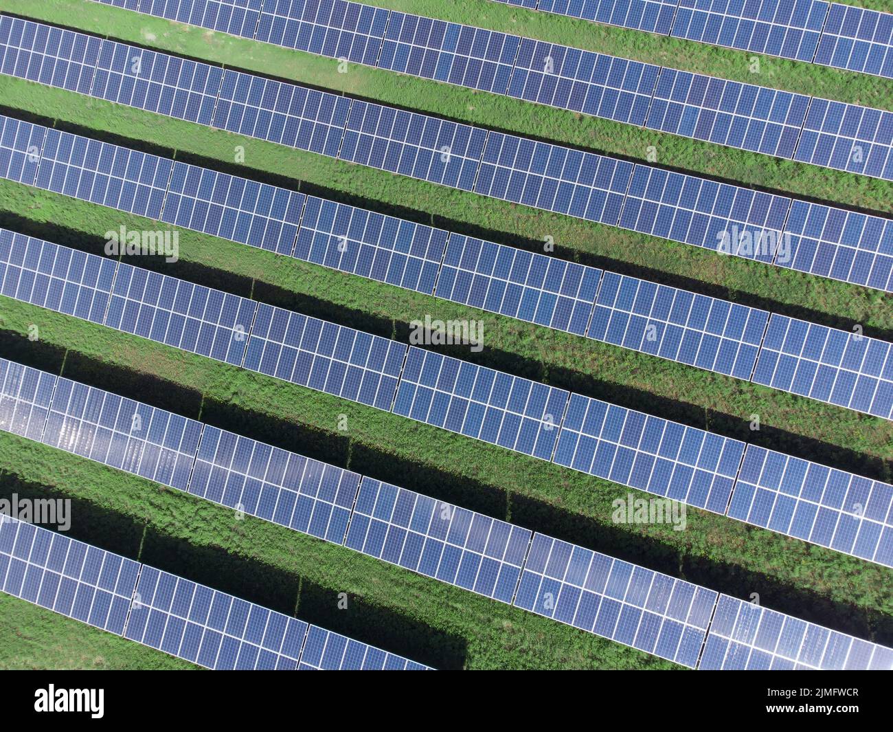 Background of solar panels on the field. Solar power plant Stock Photo ...
