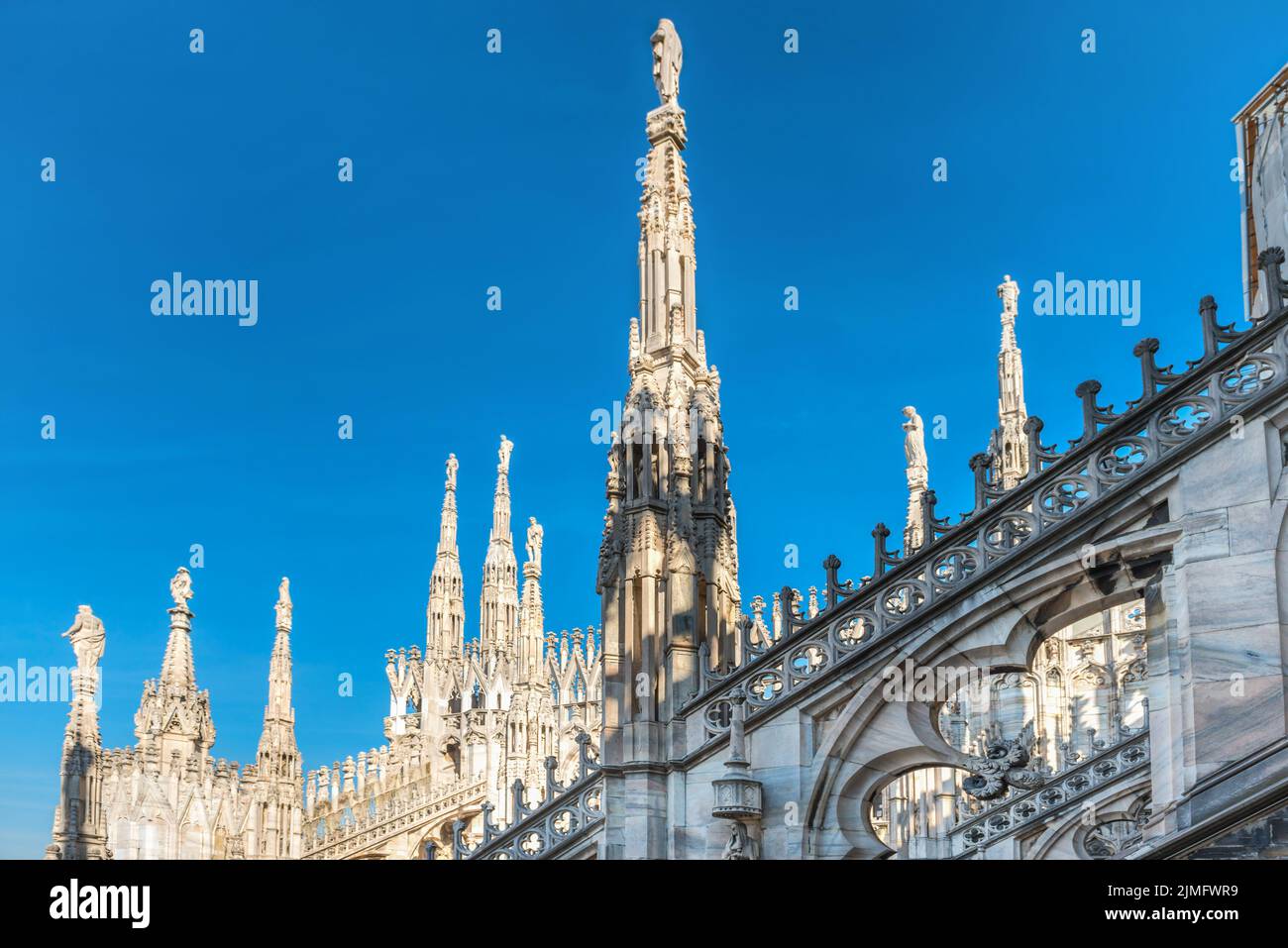 Marble statues - architecture on roof of Duomo cathedral Stock Photo ...